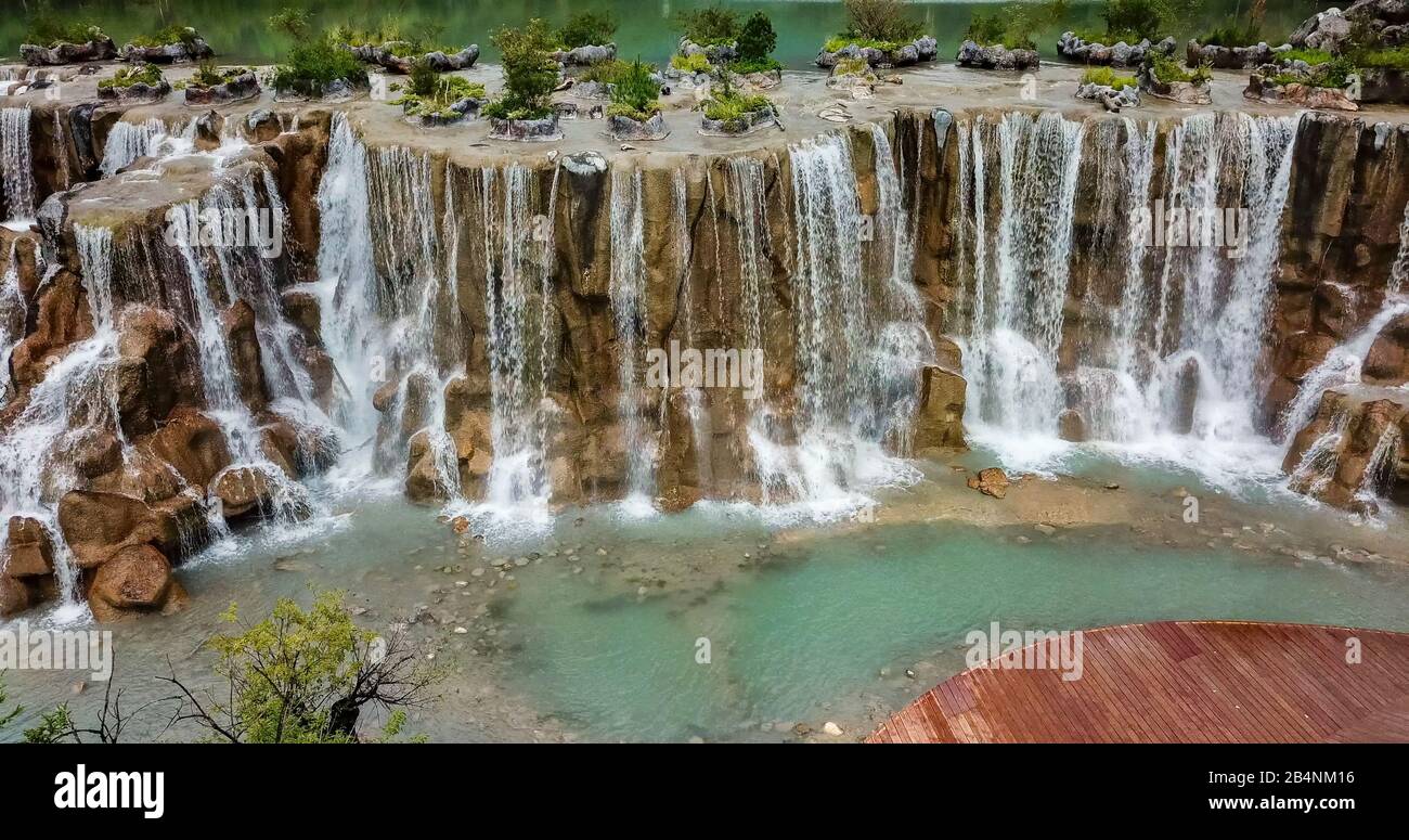 Aerial view of emerald color waterfalls at Blue Moon Valley at the foot ...