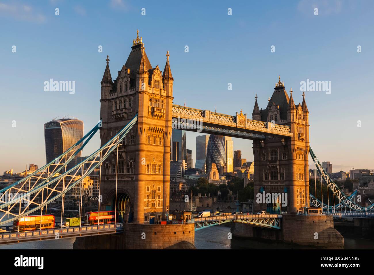 England, London, Tower Bridge, Red Double Decker Buses Crossing Tower ...
