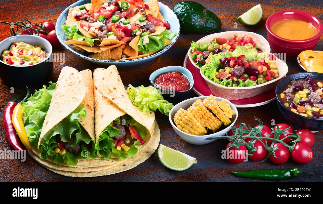 Traditional Mexican food mix on dark background Stock Photo - Alamy