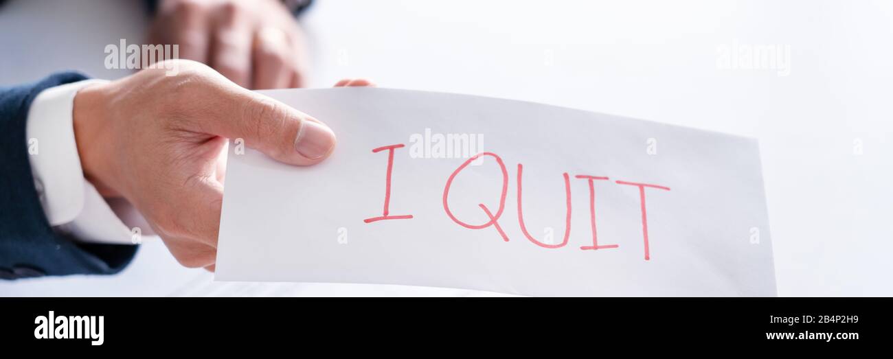 Businessman holding with I quit words card letter, resign employee ...