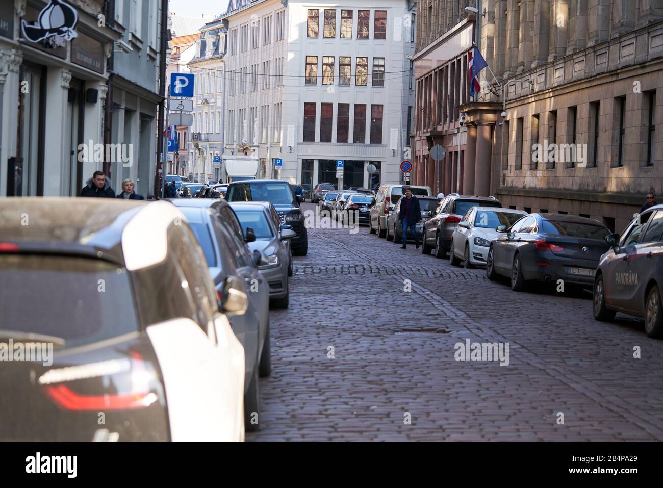 06-03-2020 Riga, Latvia Parking of cars near the sidewalk for ...