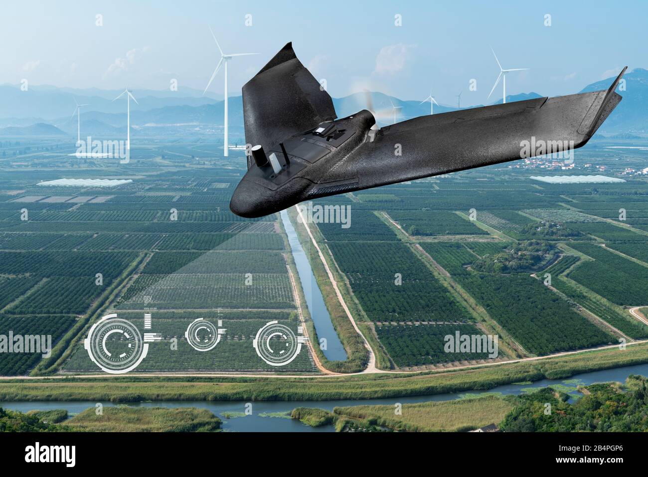 Agricultural drone flies over the field. Smart farming and digital ...