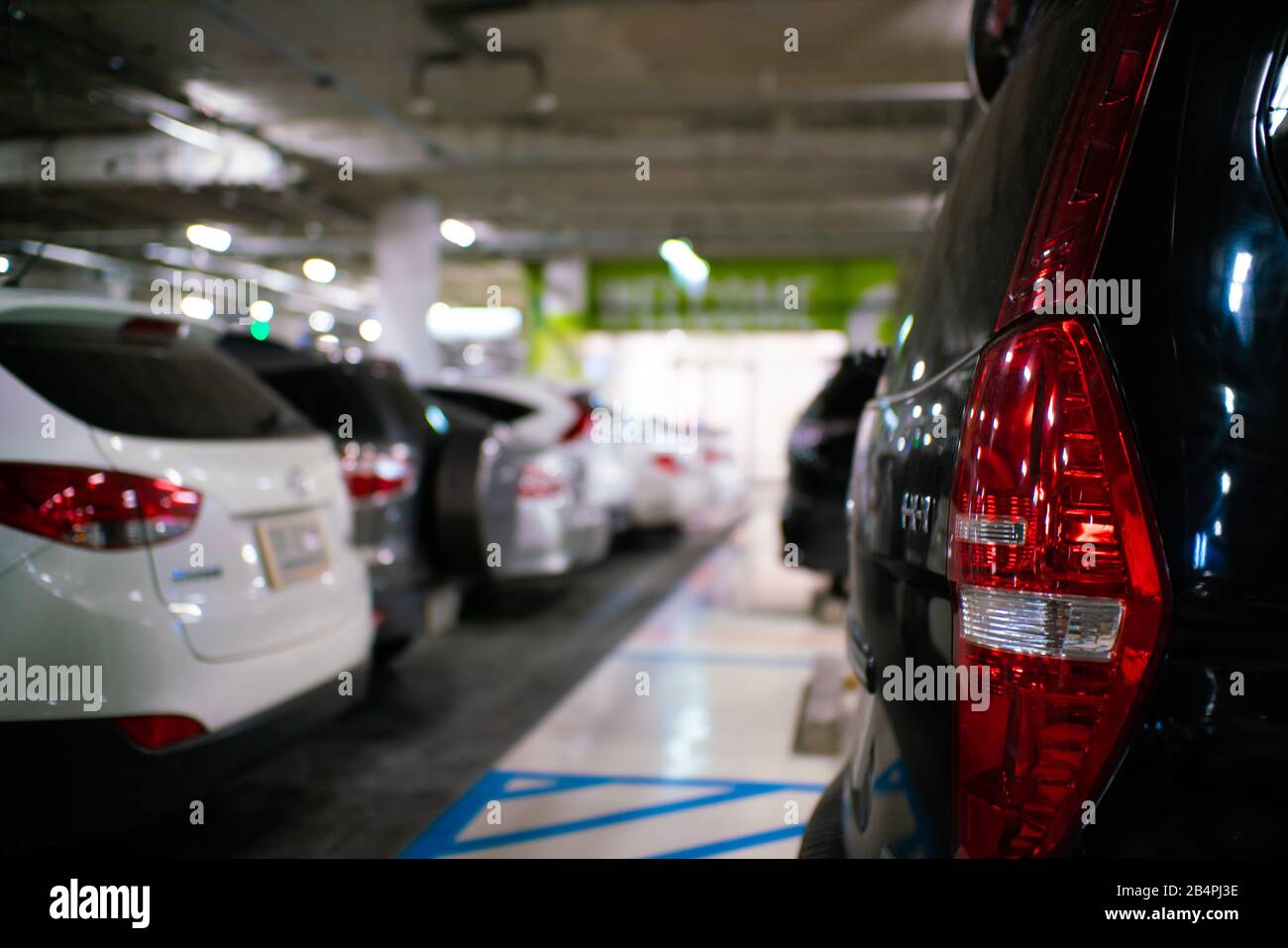 Car parking lot in supermarket building close up on car Stock Photo - Alamy