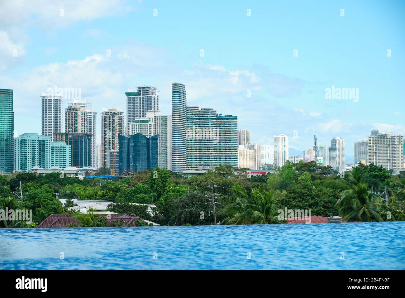 View of the city of Manila from the pool of the luxury five-star ...
