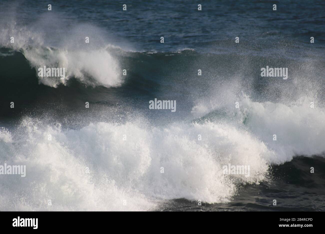 Wave breaking with surf Stock Photo - Alamy
