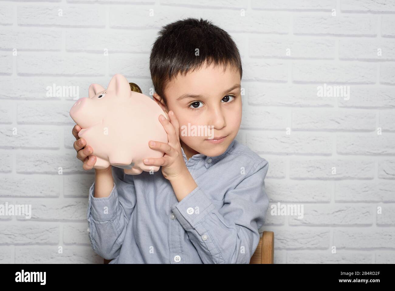 boy with pig piggy bank. childhood, money, investment and happy people ...