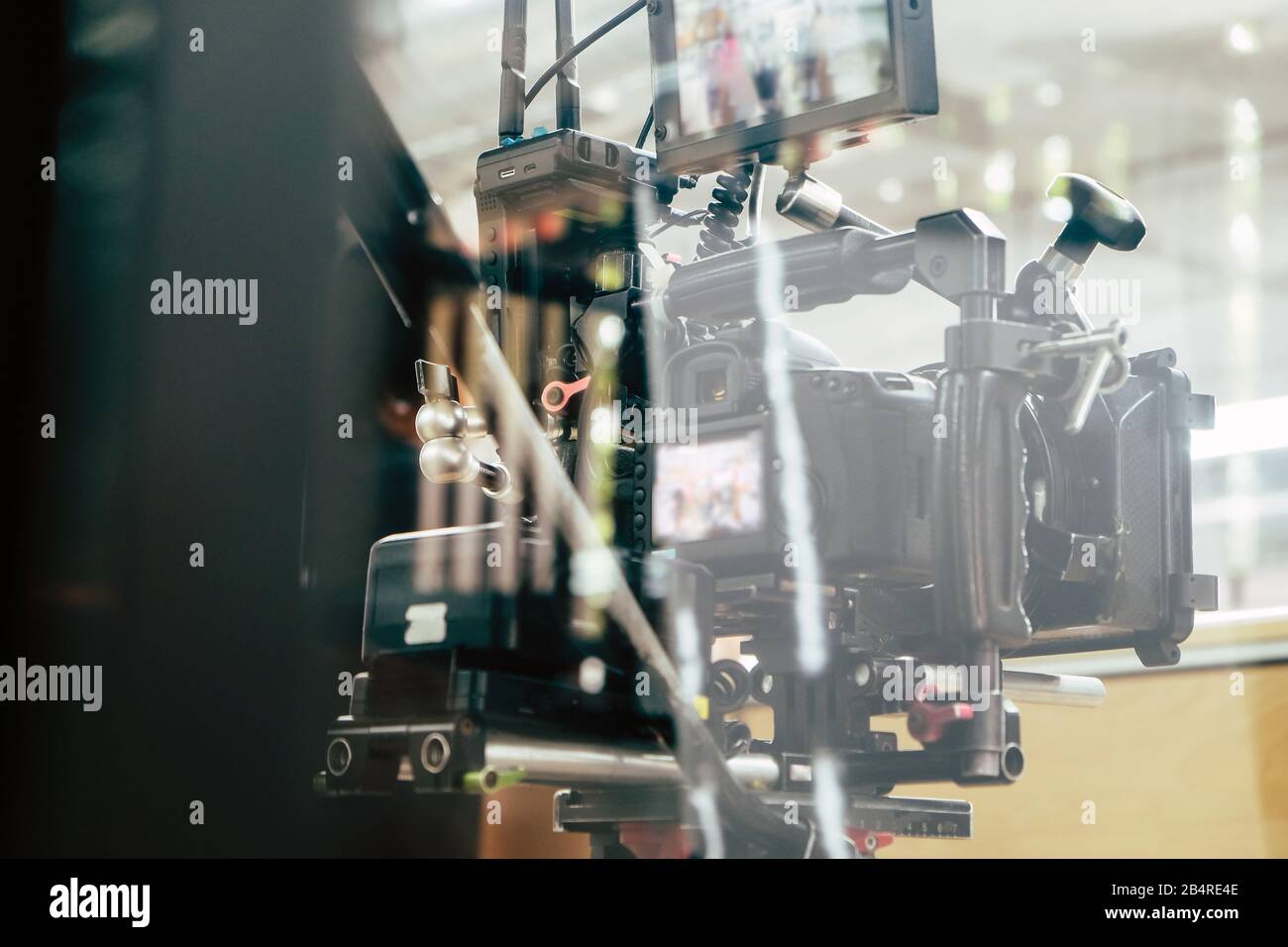 Film industry. Filming with professional camera background Stock Photo ...