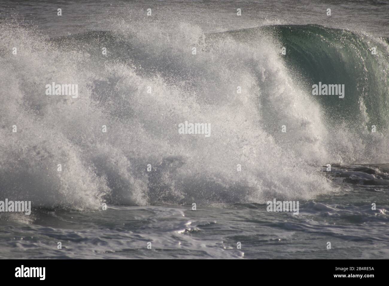 Wave breaking with surf Stock Photo - Alamy