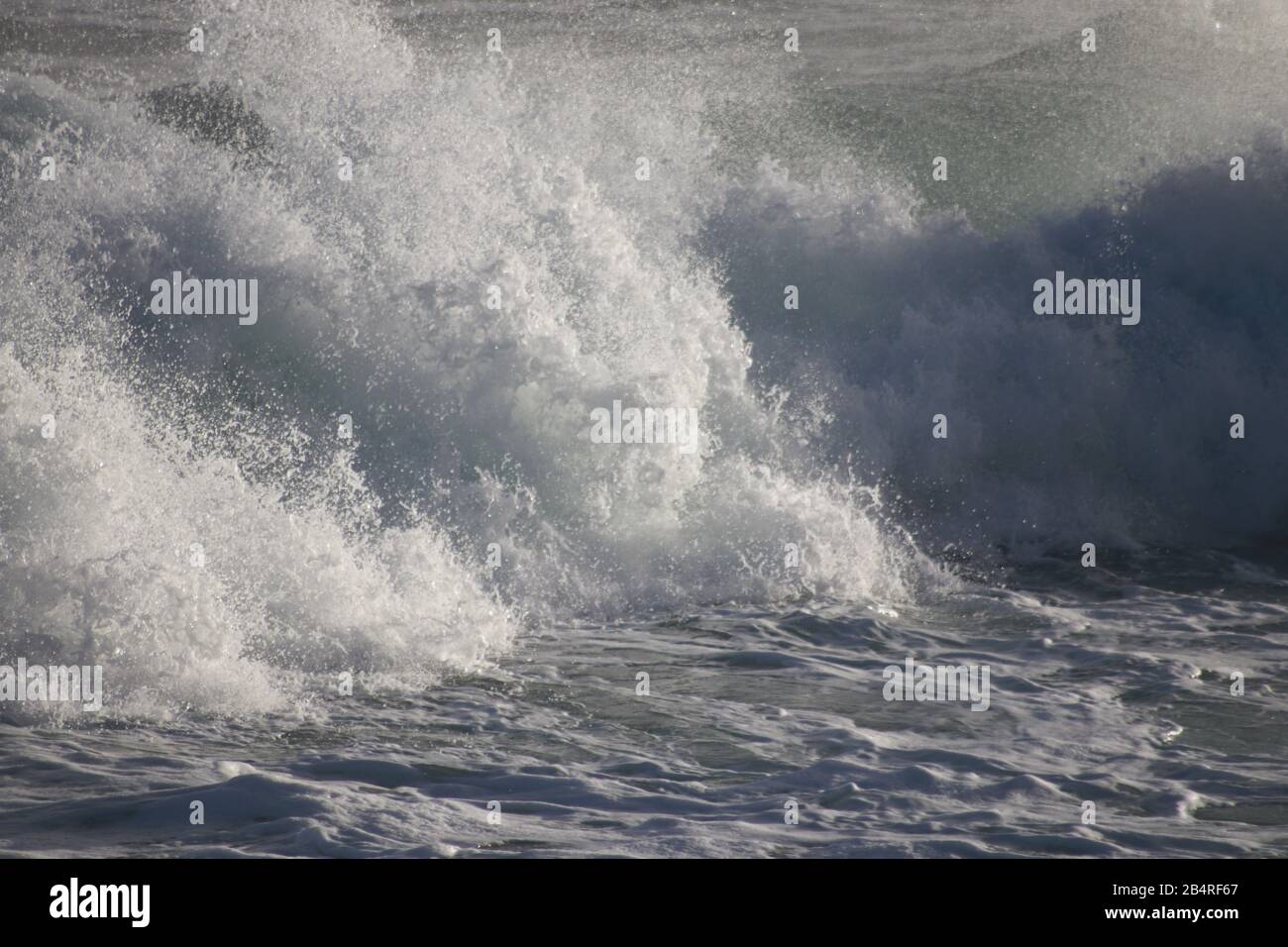 Wave breaking with surf Stock Photo - Alamy