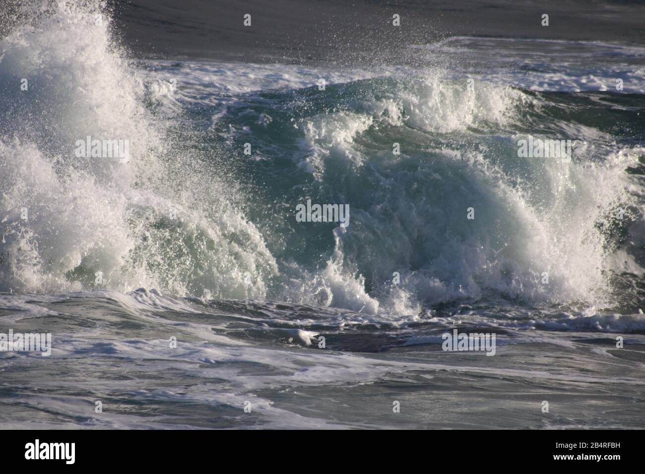 Wave breaking with surf Stock Photo - Alamy