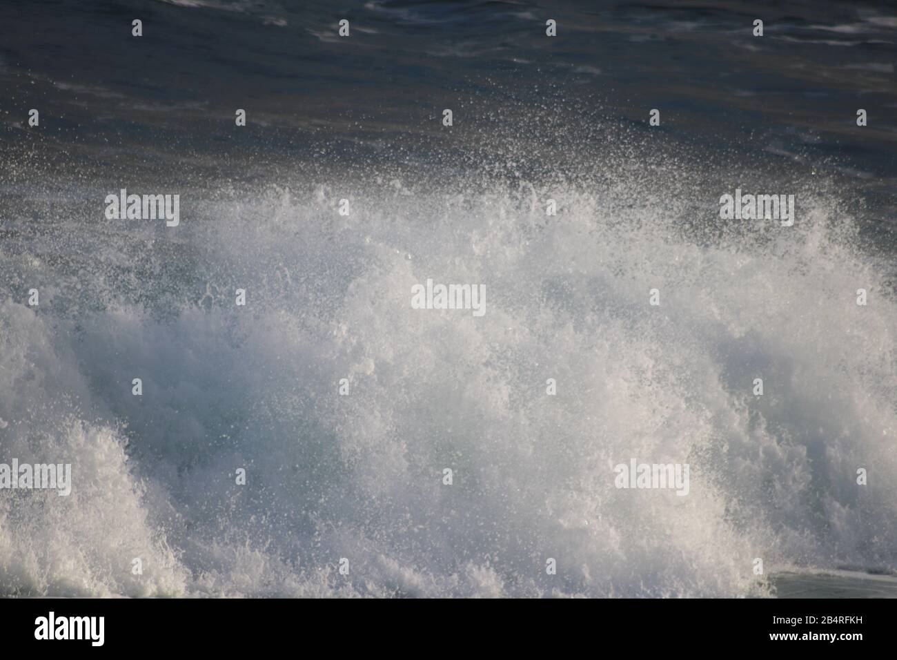 Wave breaking with surf Stock Photo - Alamy