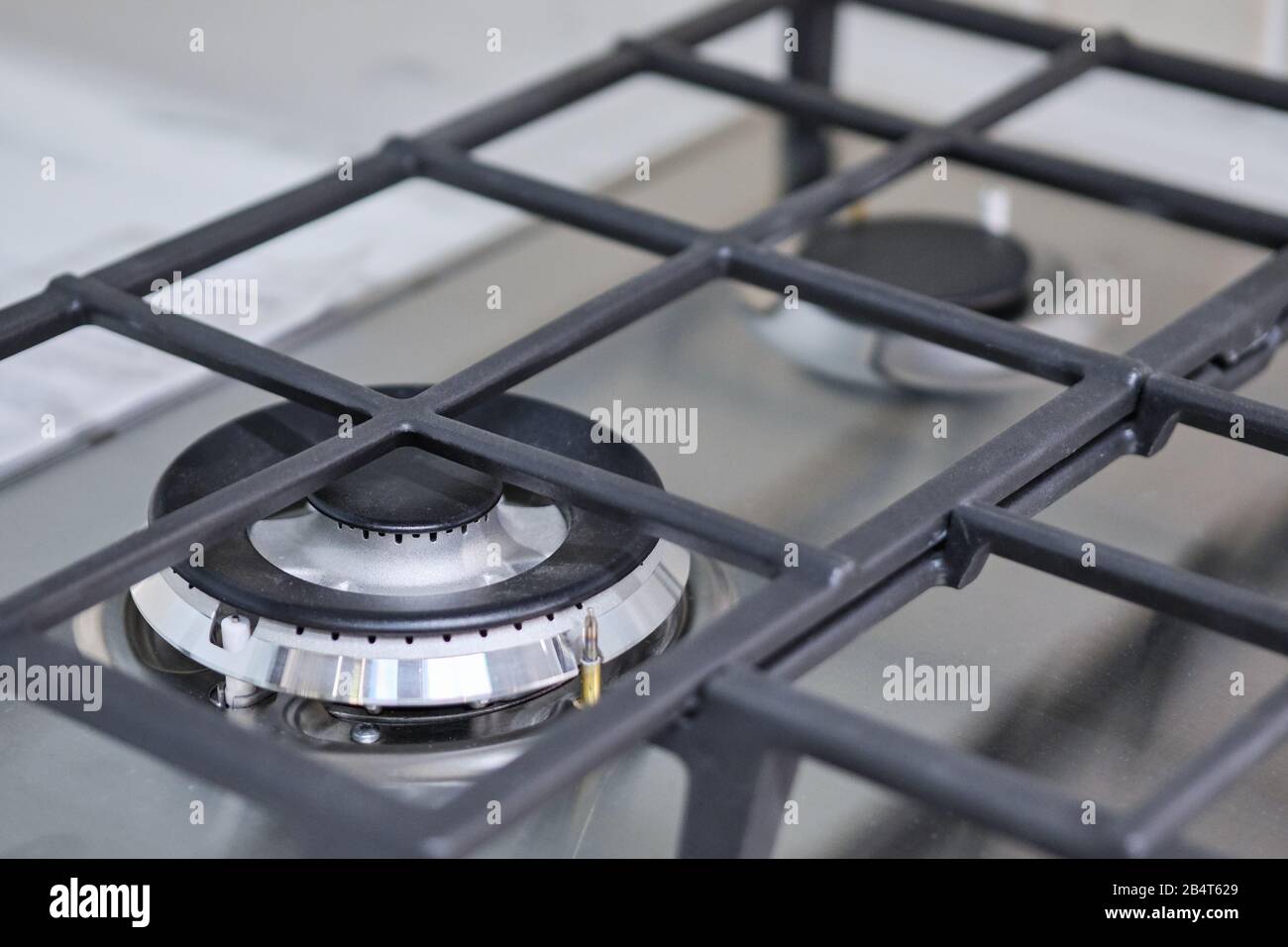 Kitchen modern gas black stove. Close up Stock Photo - Alamy