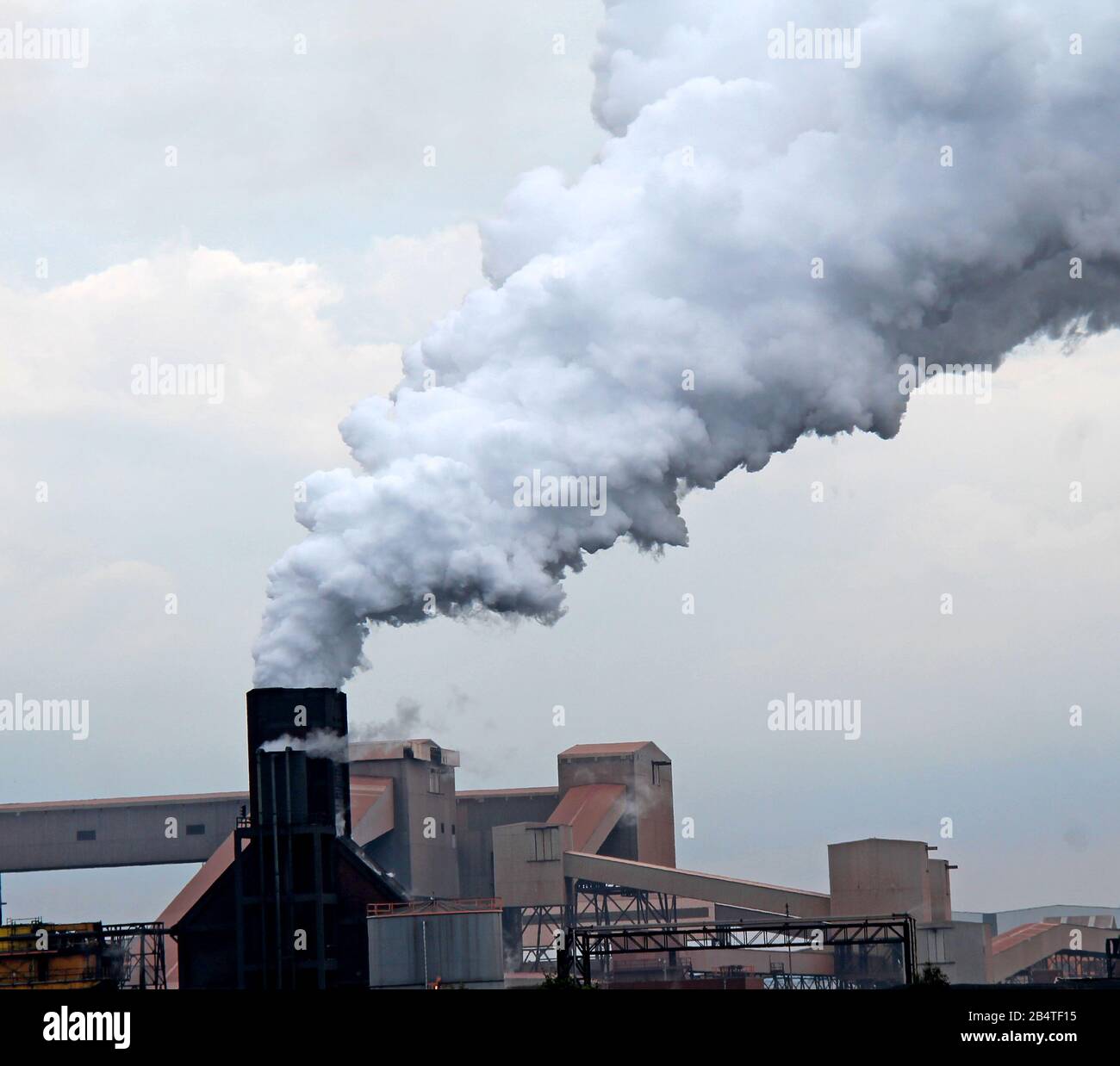Thick Smoke Belching from an Industrial Chimney Stock Photo - Alamy