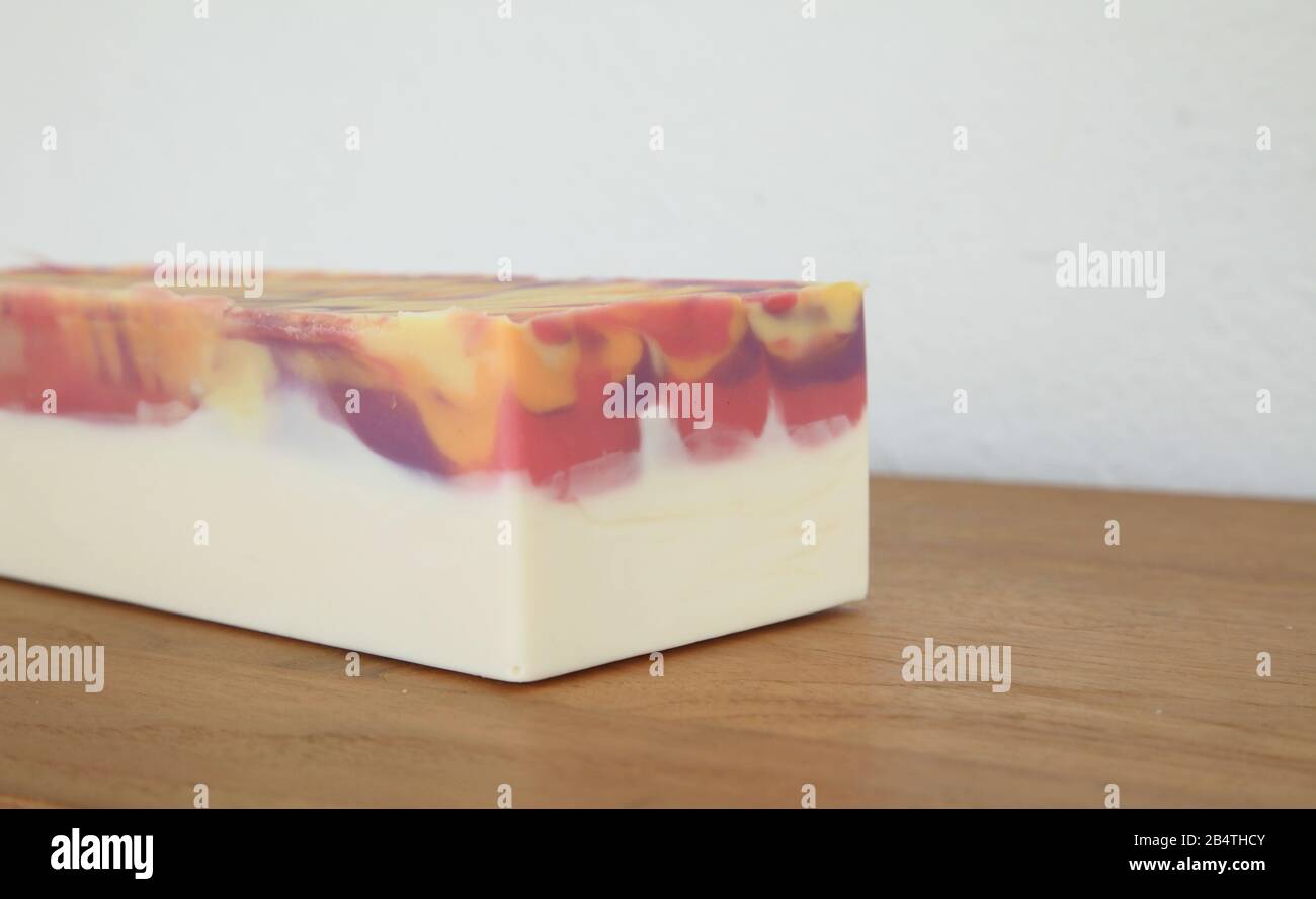 Handmade cold process peach soap on display Stock Photo - Alamy