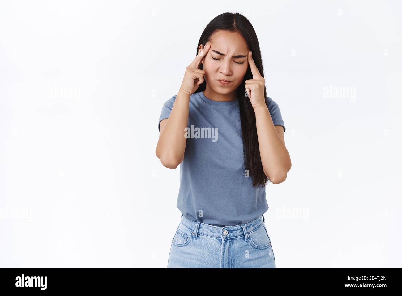 Troubled and distressed girl trying think straight and concentrate on ...