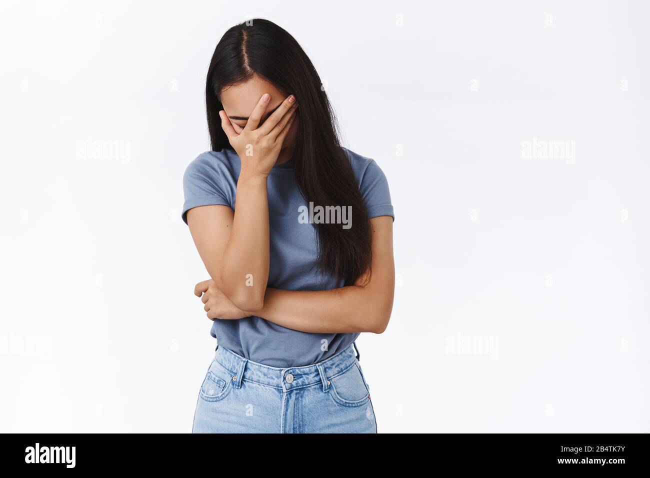 Embarrassed and tired, pissed young asian woman making facepalm, lean ...