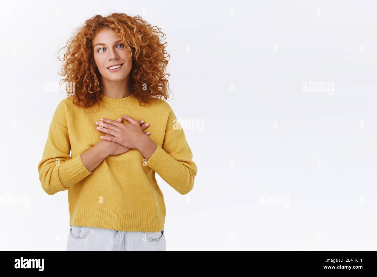 Tender, touched redhead caucasian female with curly ginger hair, press ...