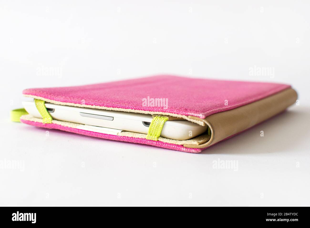 E-book reader in pink case on white background Stock Photo - Alamy