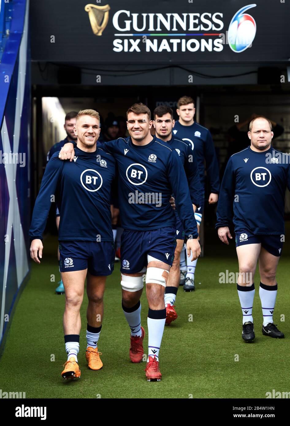 Scotland's Chris Harris (left) and Sam Skinner walk out for the captain ...