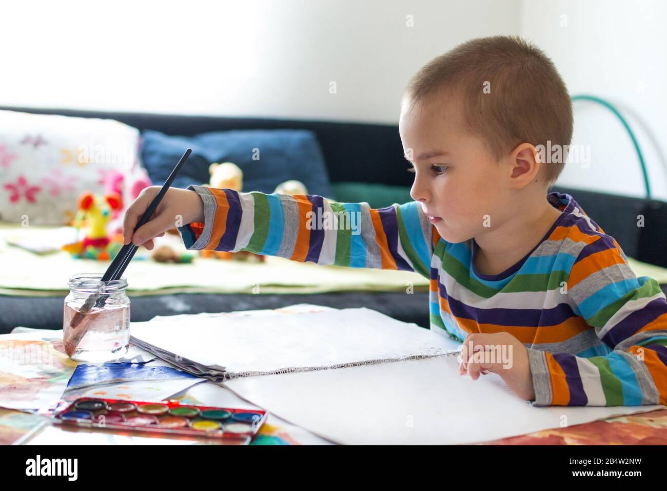 Cute boy painting and drawing at home. Children's creativity Stock ...