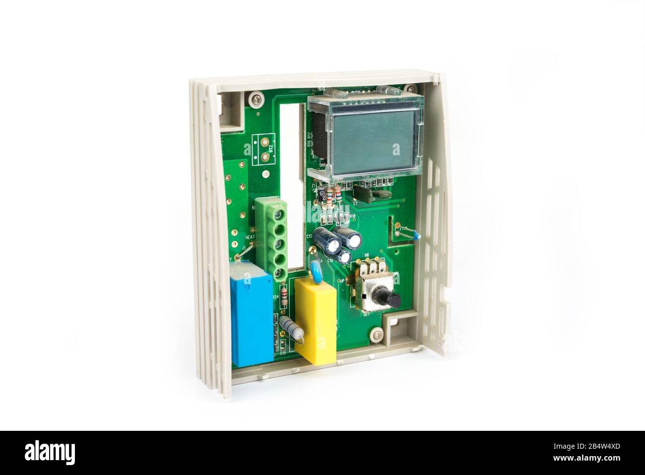 Simple thermostat for heating control on a white Stock Photo - Alamy