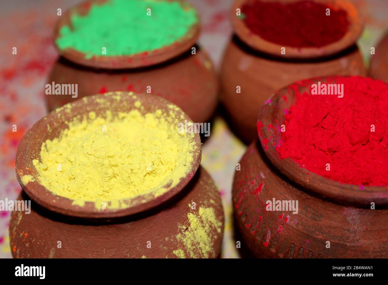 colorful traditional holi powder in bowls, Organic Gulal colors for ...