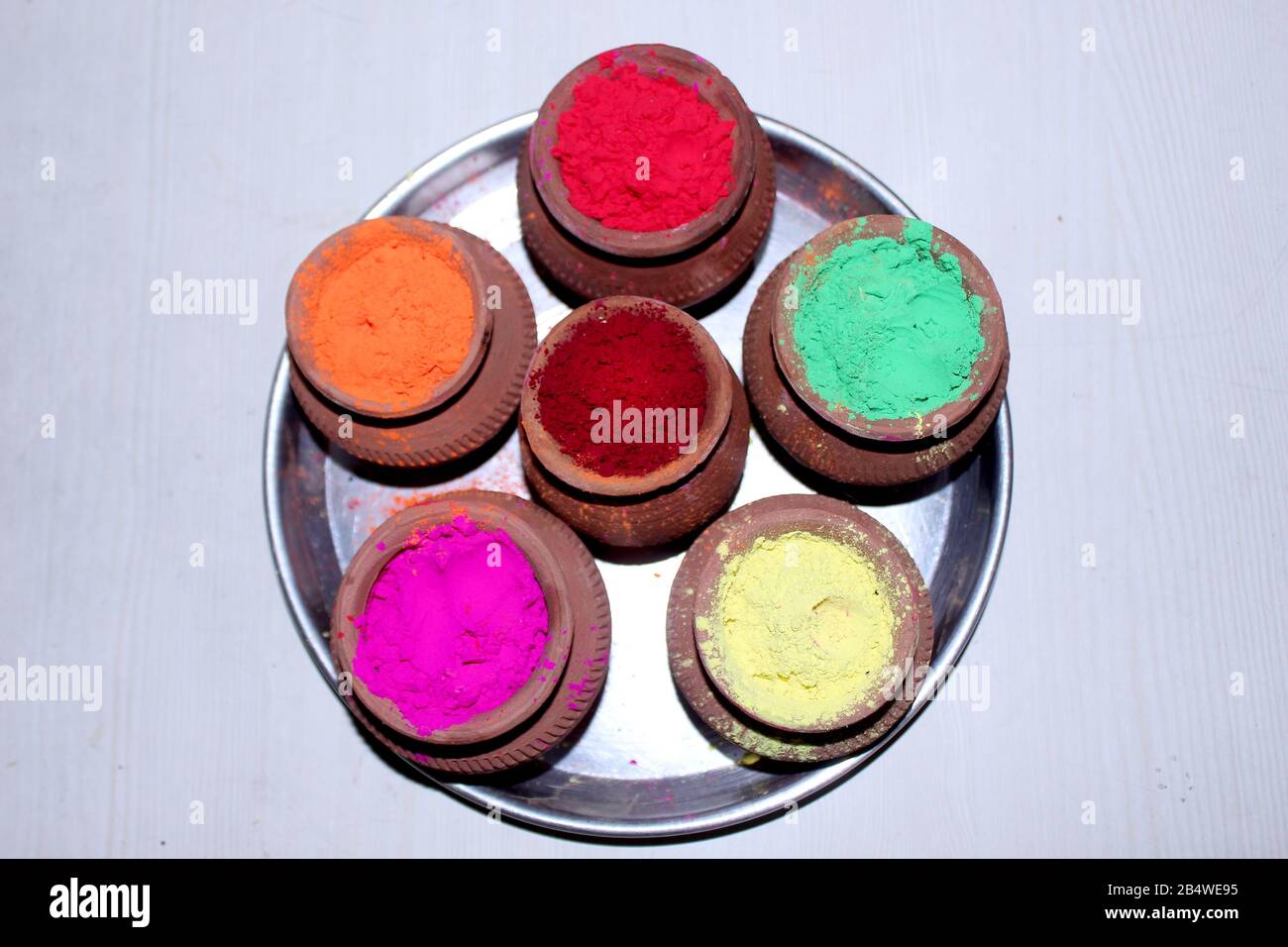 colorful traditional holi powder in bowls, Organic Gulal colors for ...