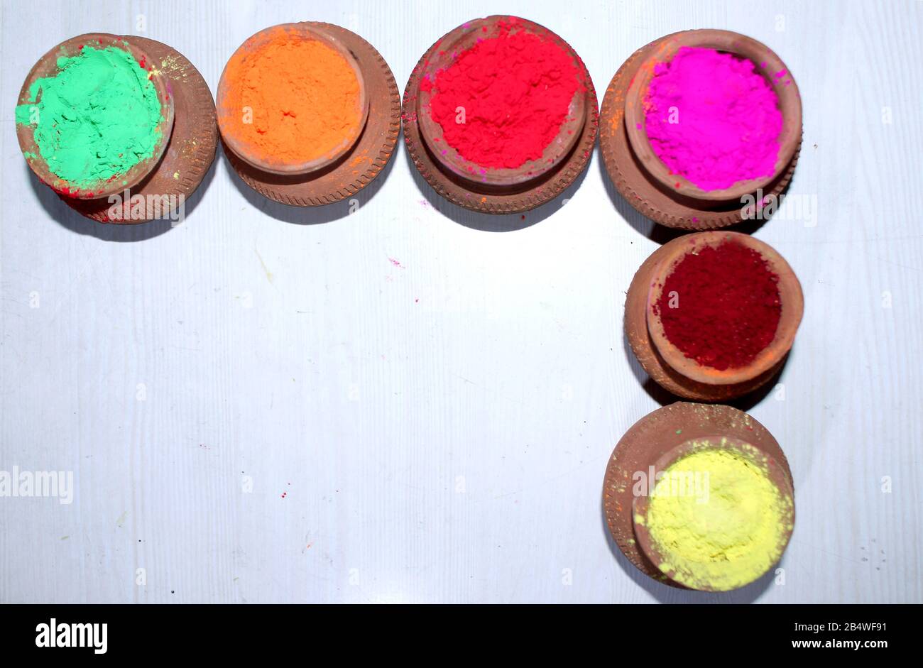 colorful traditional holi powder in bowls, Organic Gulal colors for ...