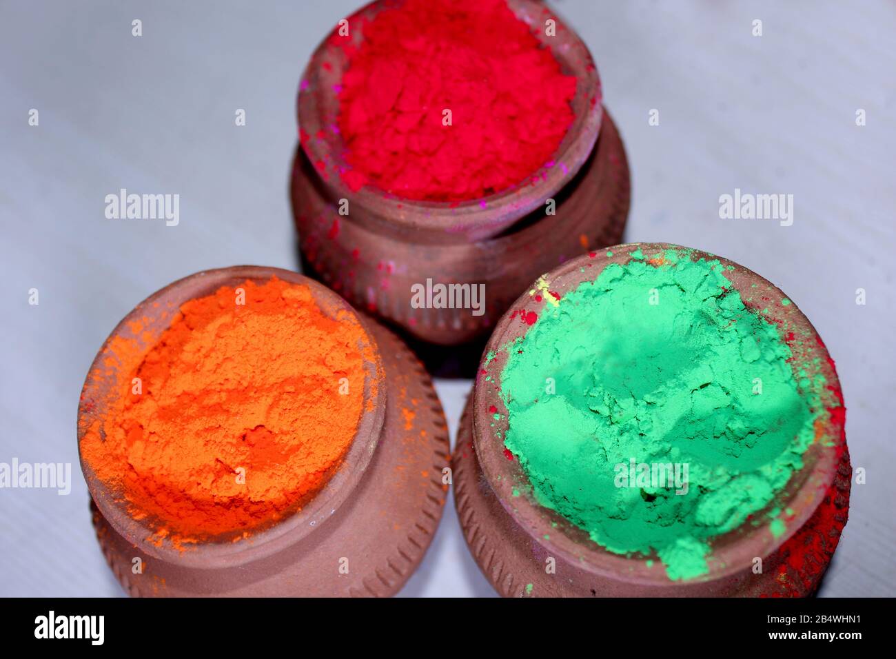 colorful traditional holi powder in bowls, Organic Gulal colors for ...