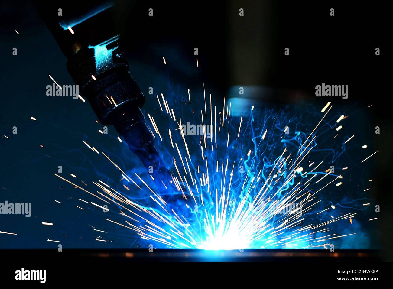 Chinese workers manufacture integrated electric motors at the plant of ...