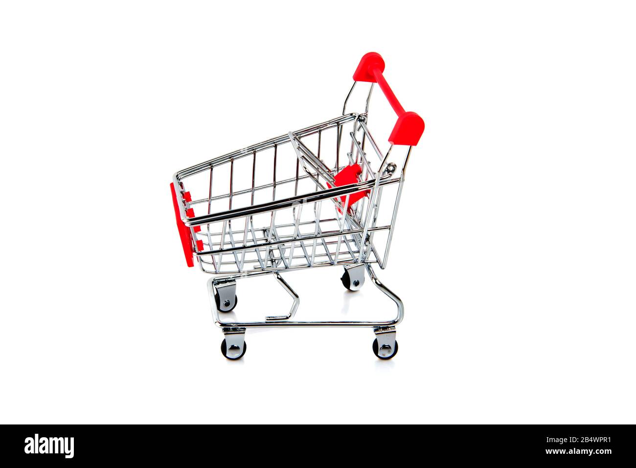 Empty red shopping cart isolated on white background Stock Photo - Alamy