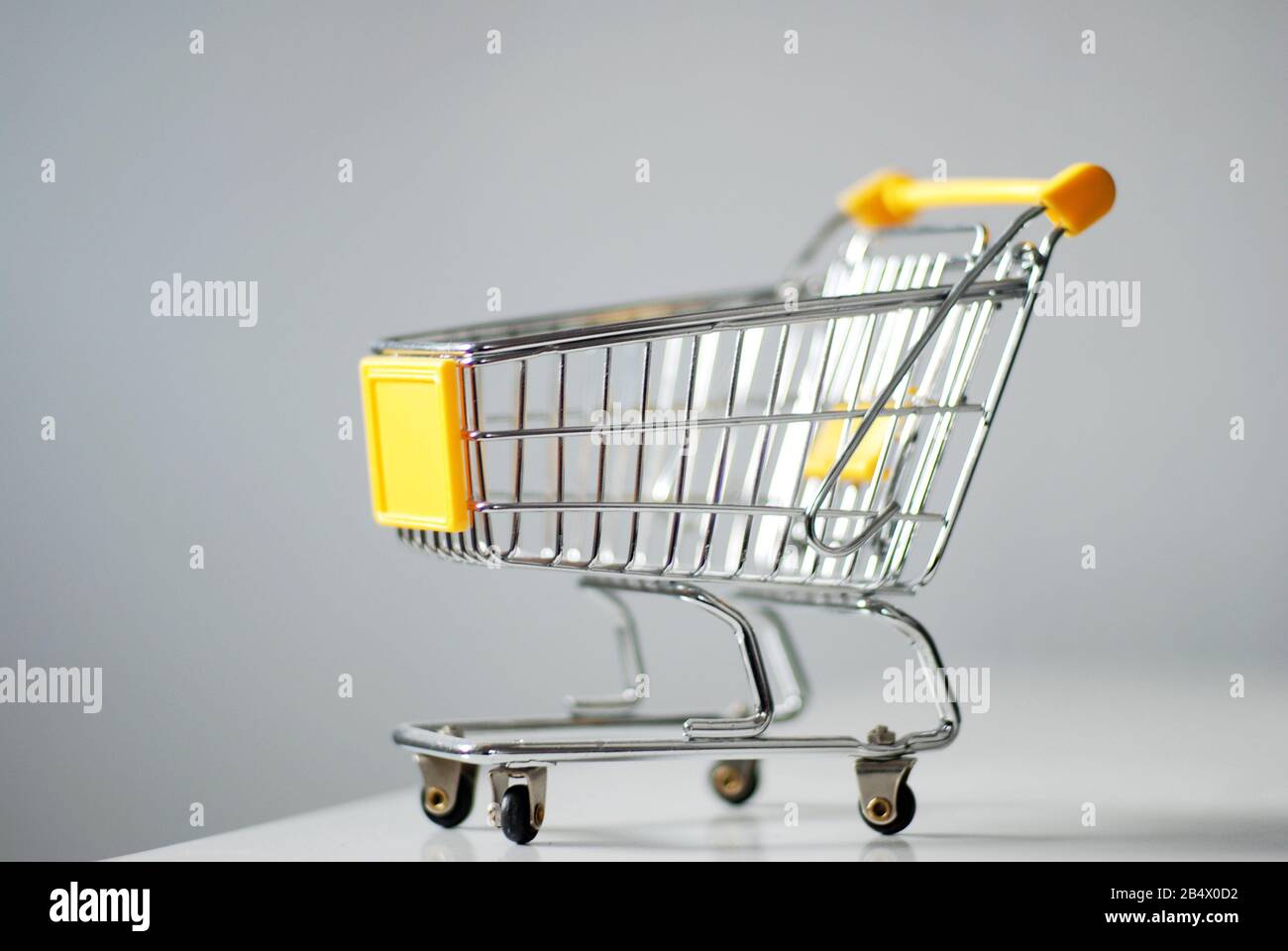 small empty shopping trolley Stock Photo - Alamy