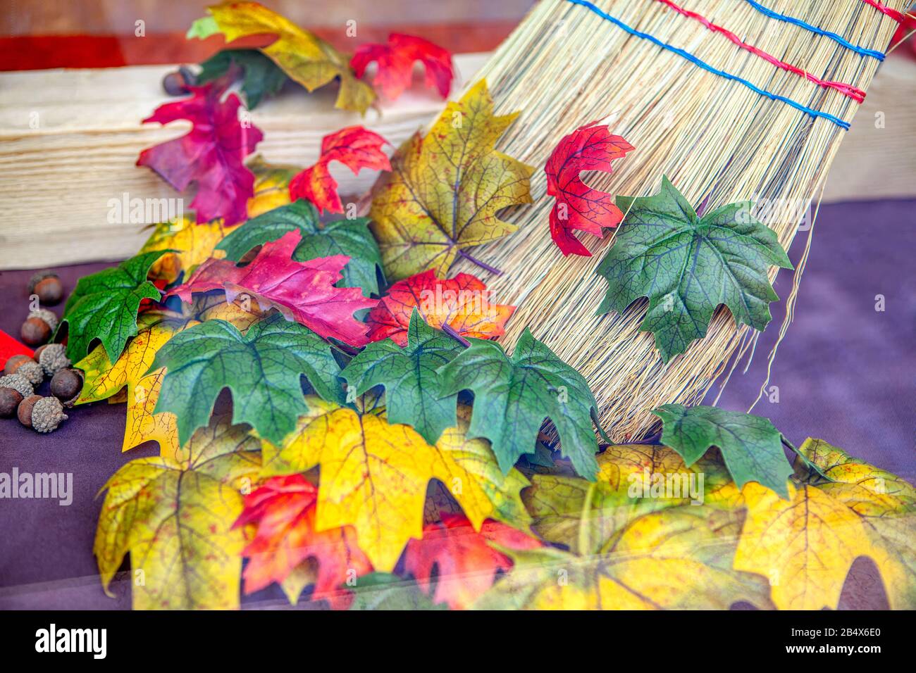 broom and colorful autumn leaves Stock Photo - Alamy
