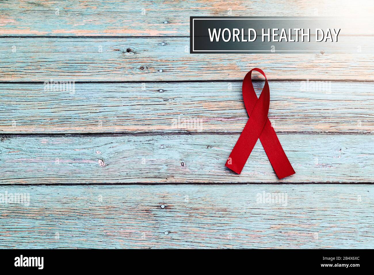 World health day, healthcare and medical concept, red ribbon on the ...