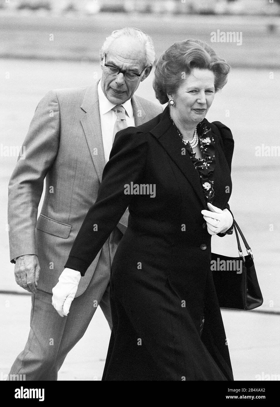 Prime Minister Margaret Thatcher with husband Denis leaving London's ...
