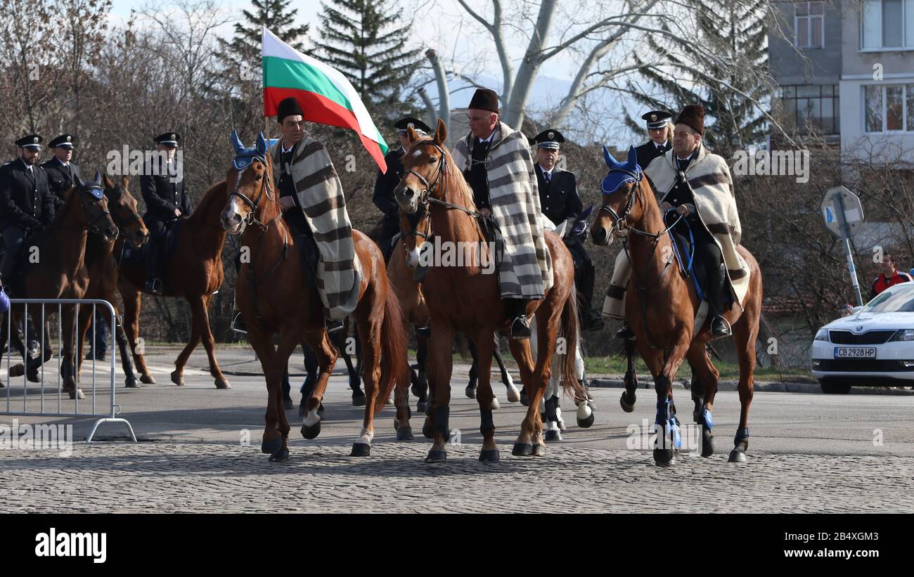 Bulgarian men ride their horses during celebrations marking the ...