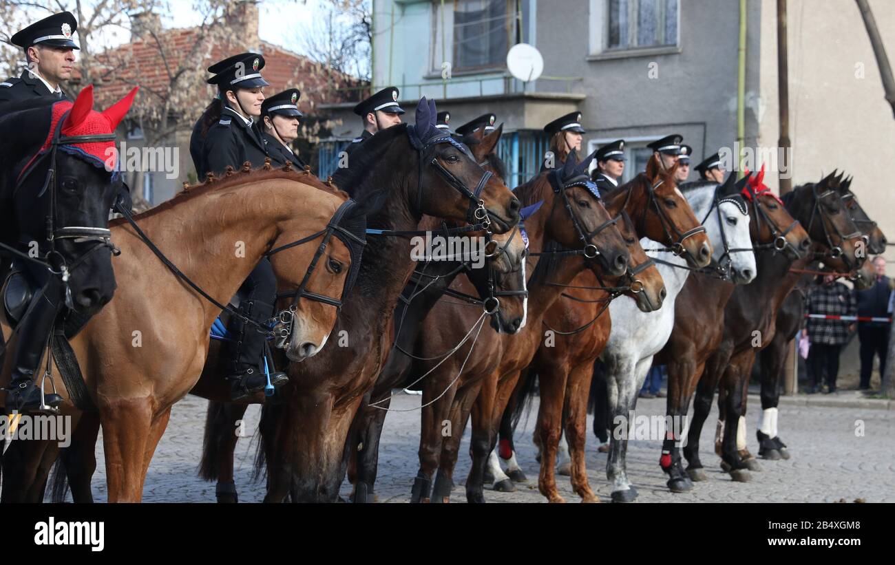 Bulgarian men ride their horses during celebrations marking the ...