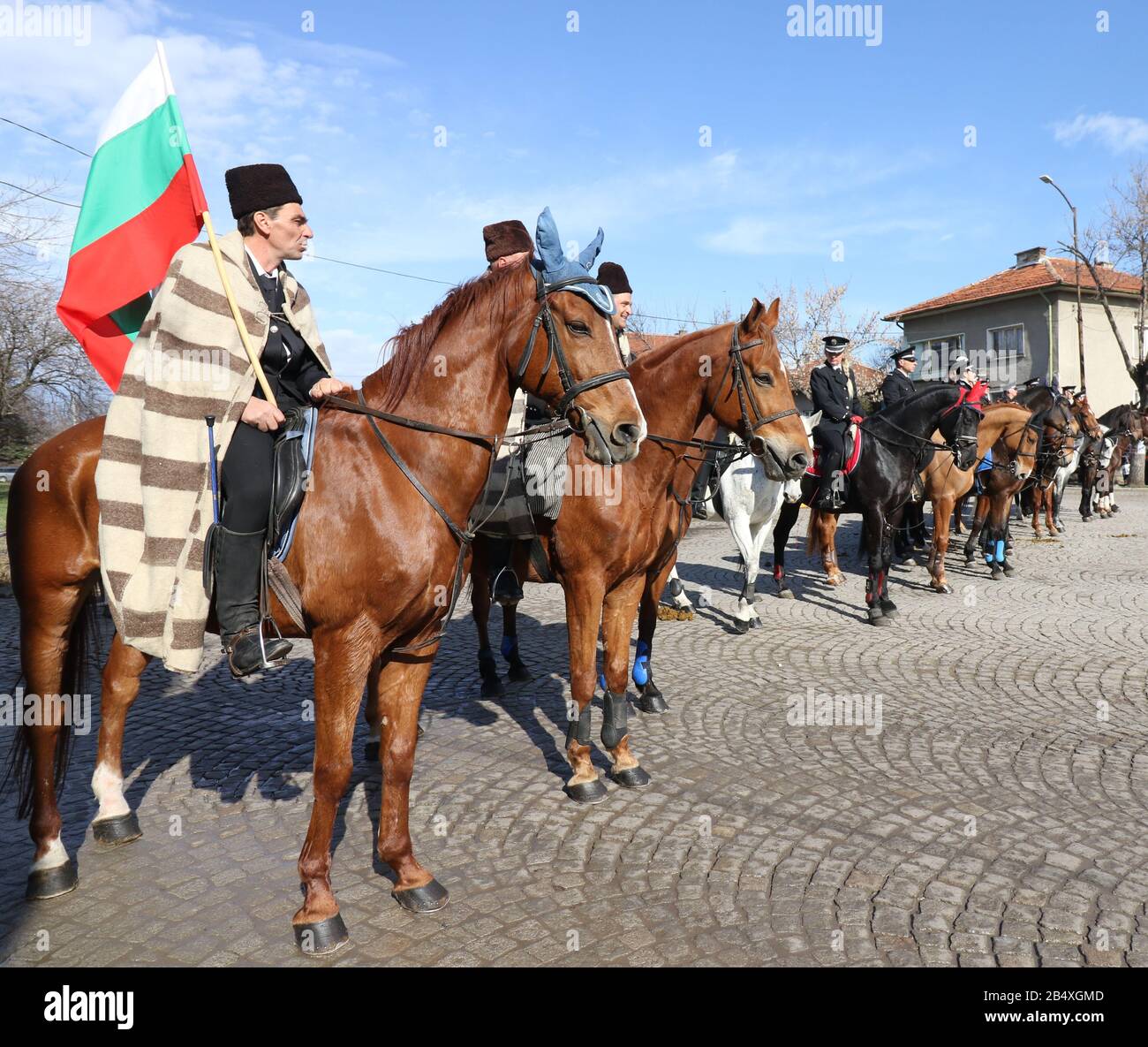 Bulgarian men ride their horses during celebrations marking the ...