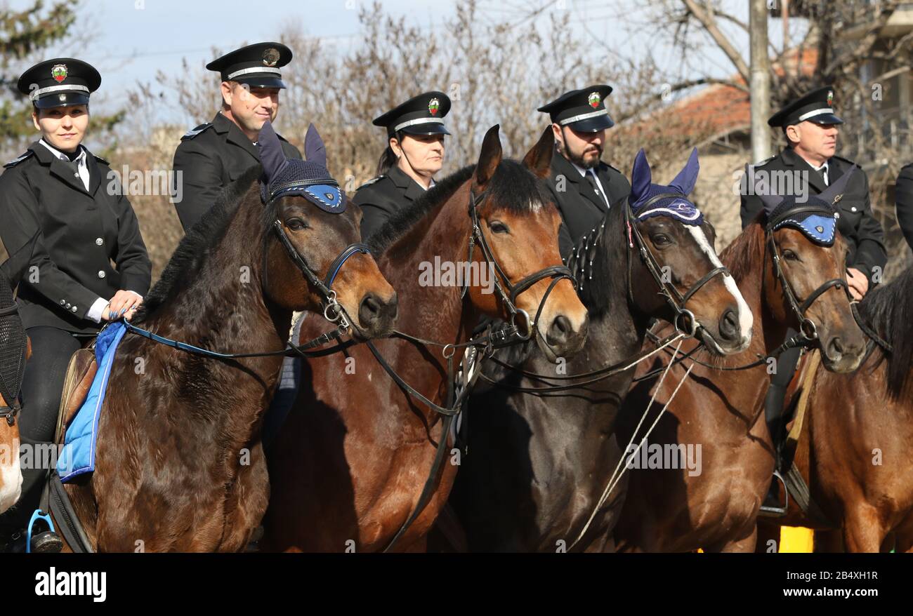 Bulgarian men ride their horses during celebrations marking the ...