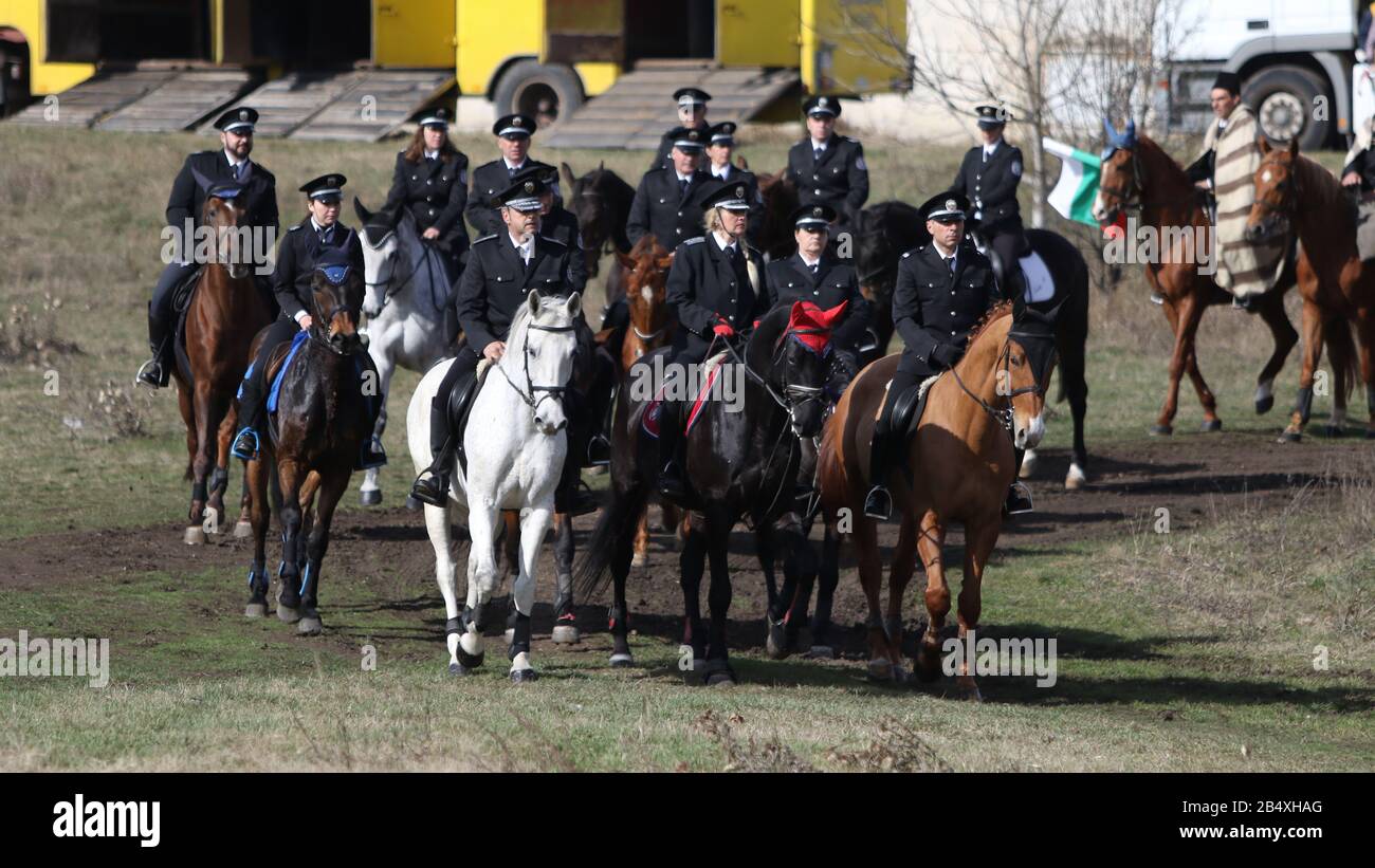 Bulgarian men ride their horses during celebrations marking the ...