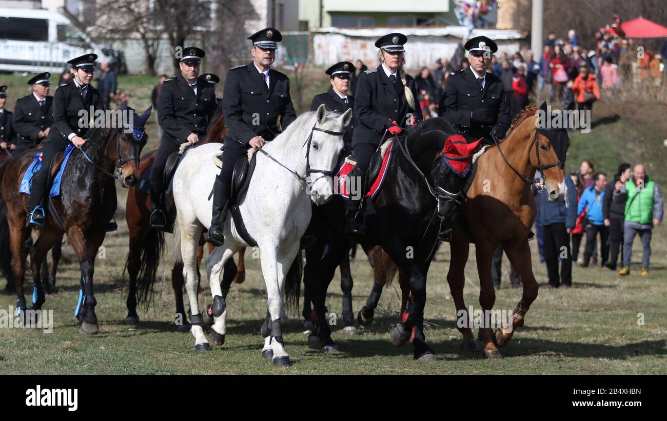 Bulgarian men ride their horses during celebrations marking the ...