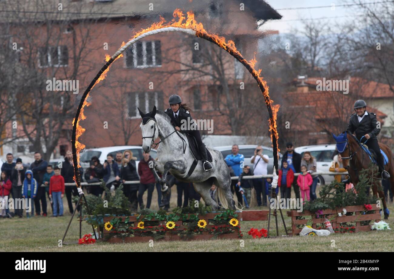 Bulgarian men ride their horses during celebrations marking the ...