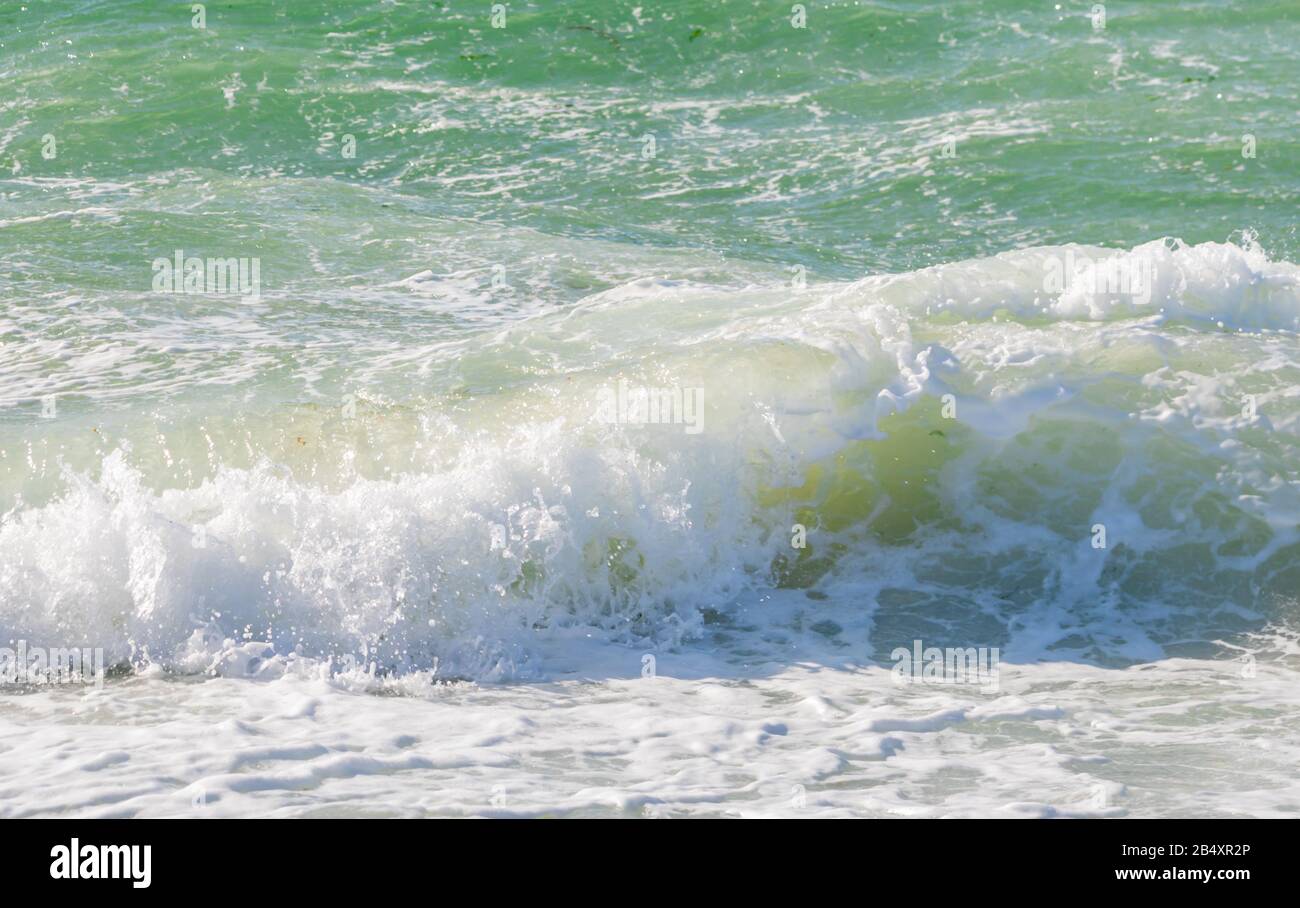 Wave and beach hi-res stock photography and images - Alamy