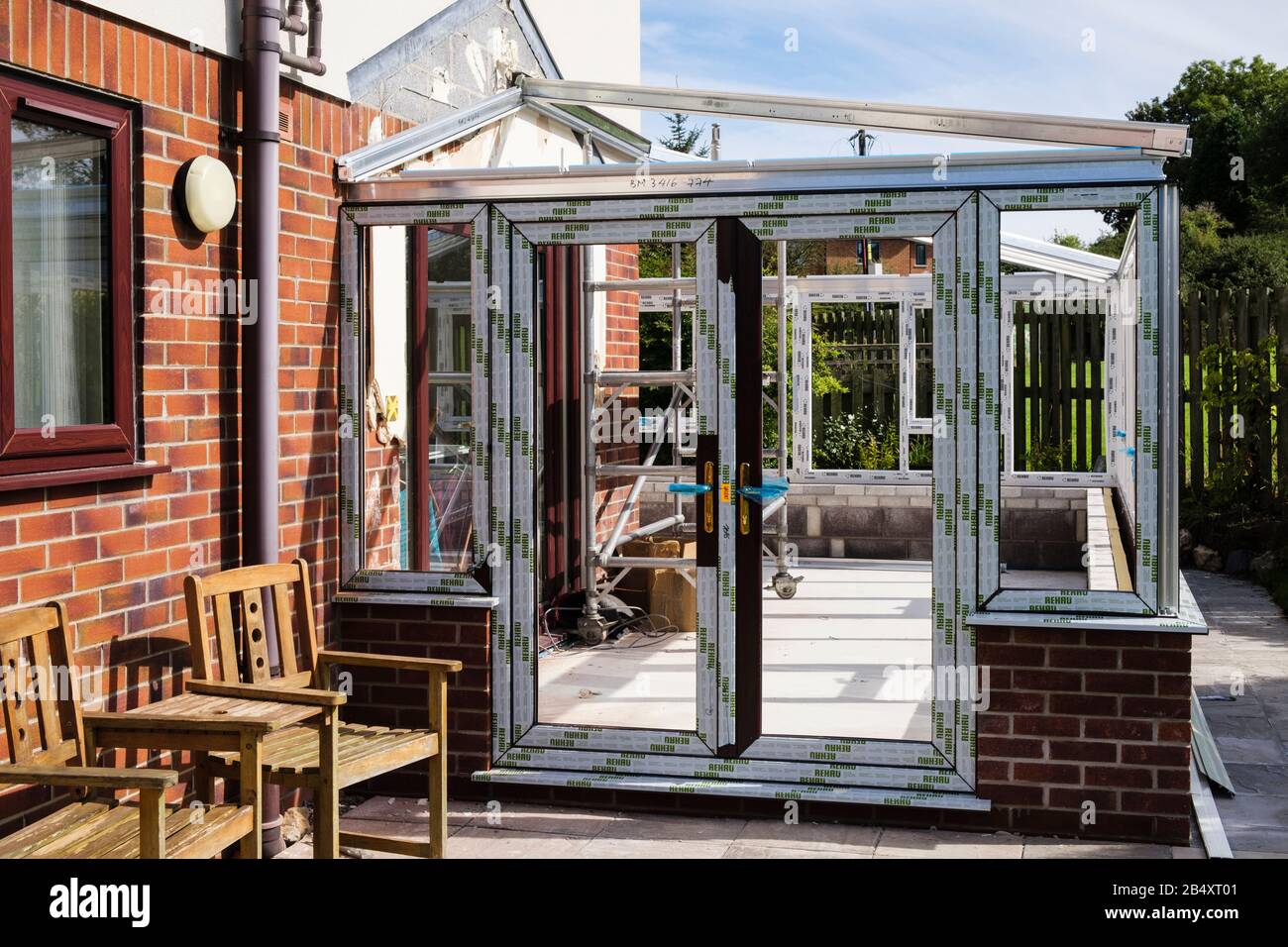 A part built new conservatory construction in the back garden of a ...