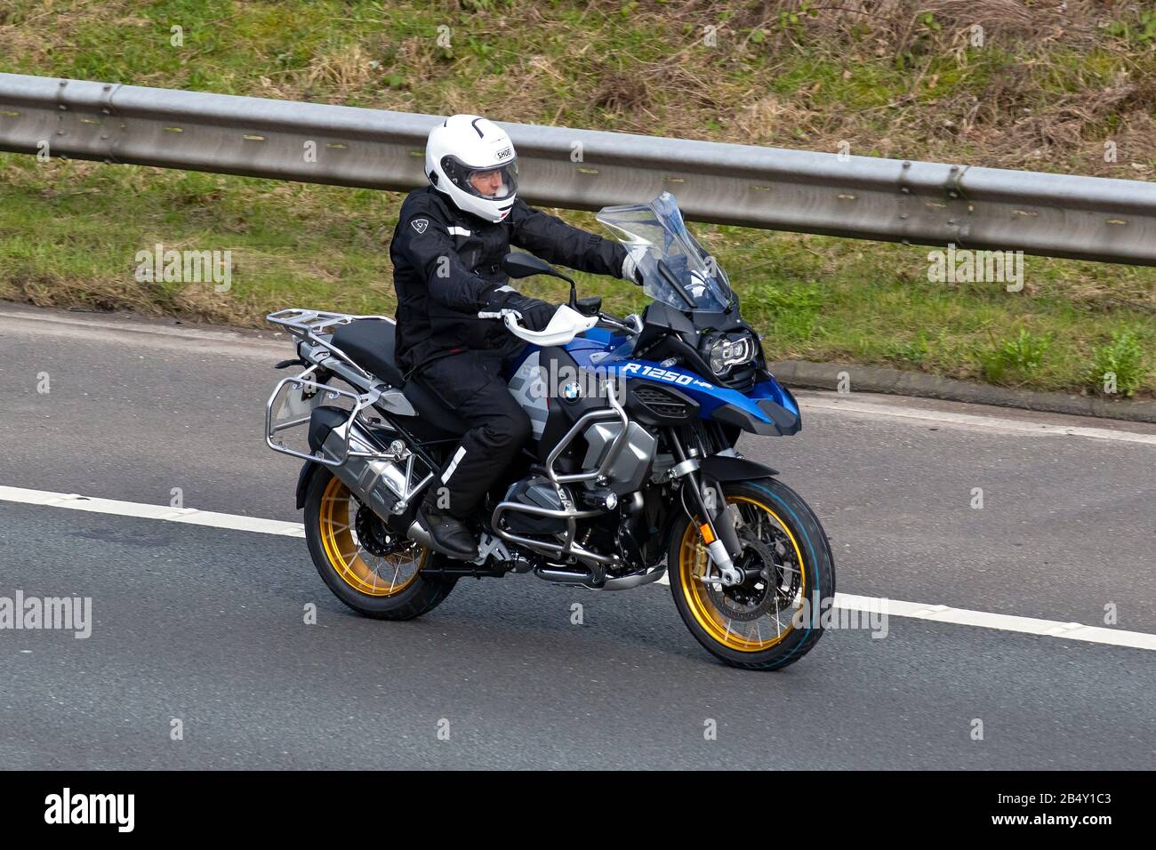 BMW R1250 Motorcycle & Rider; Vehicular traffic, two wheeled transport ...