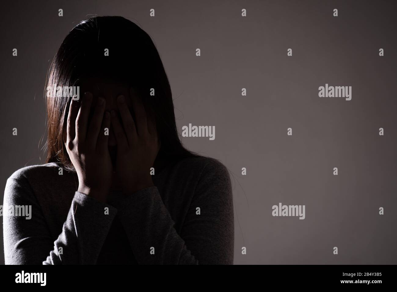 Sad Woman Hug Her Knee And Cry Sad Woman Sitting Alone In A Empty Room