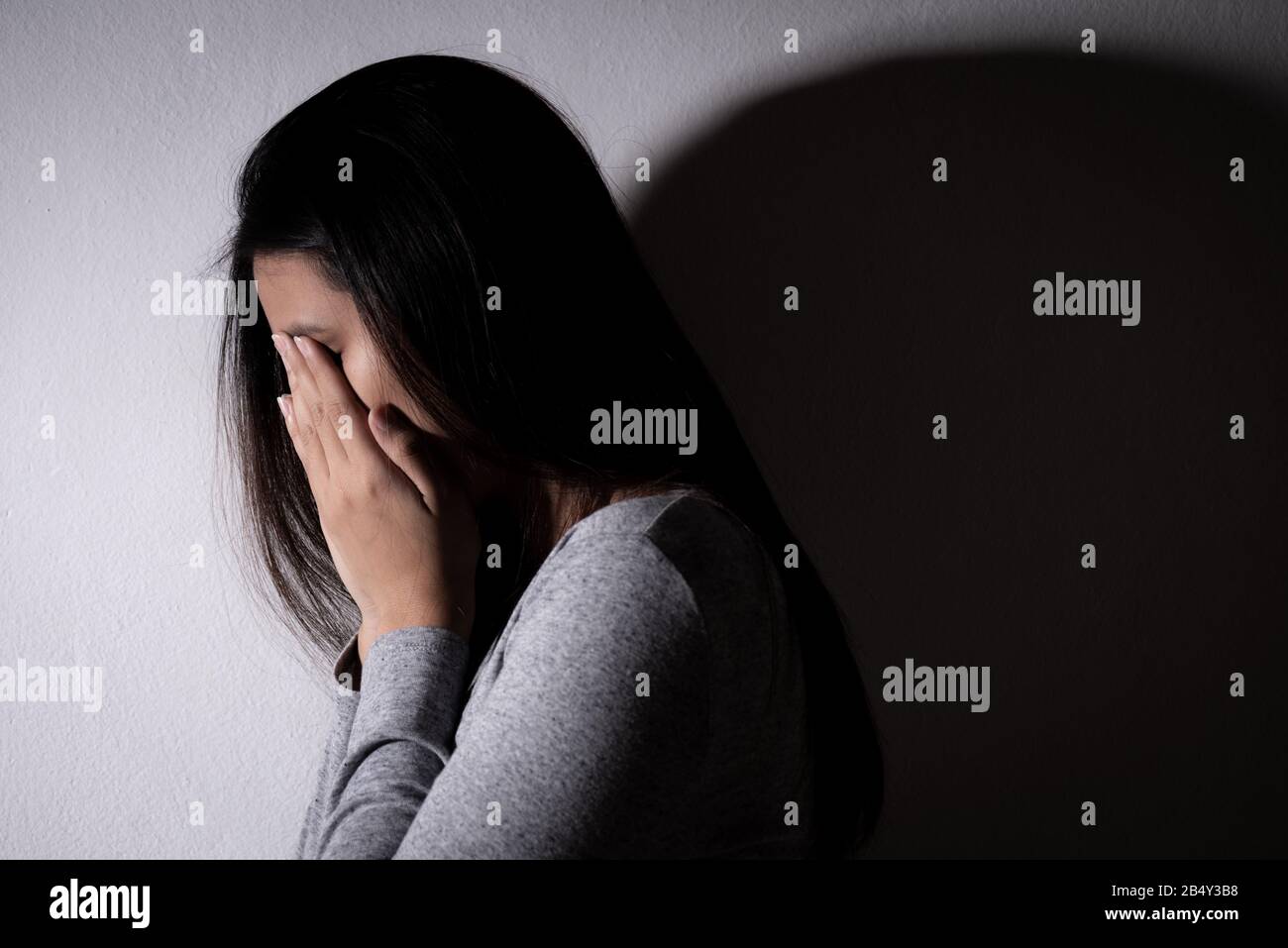 Sad Woman Hug Her Knee And Cry Sad Woman Sitting Alone In A Empty Room