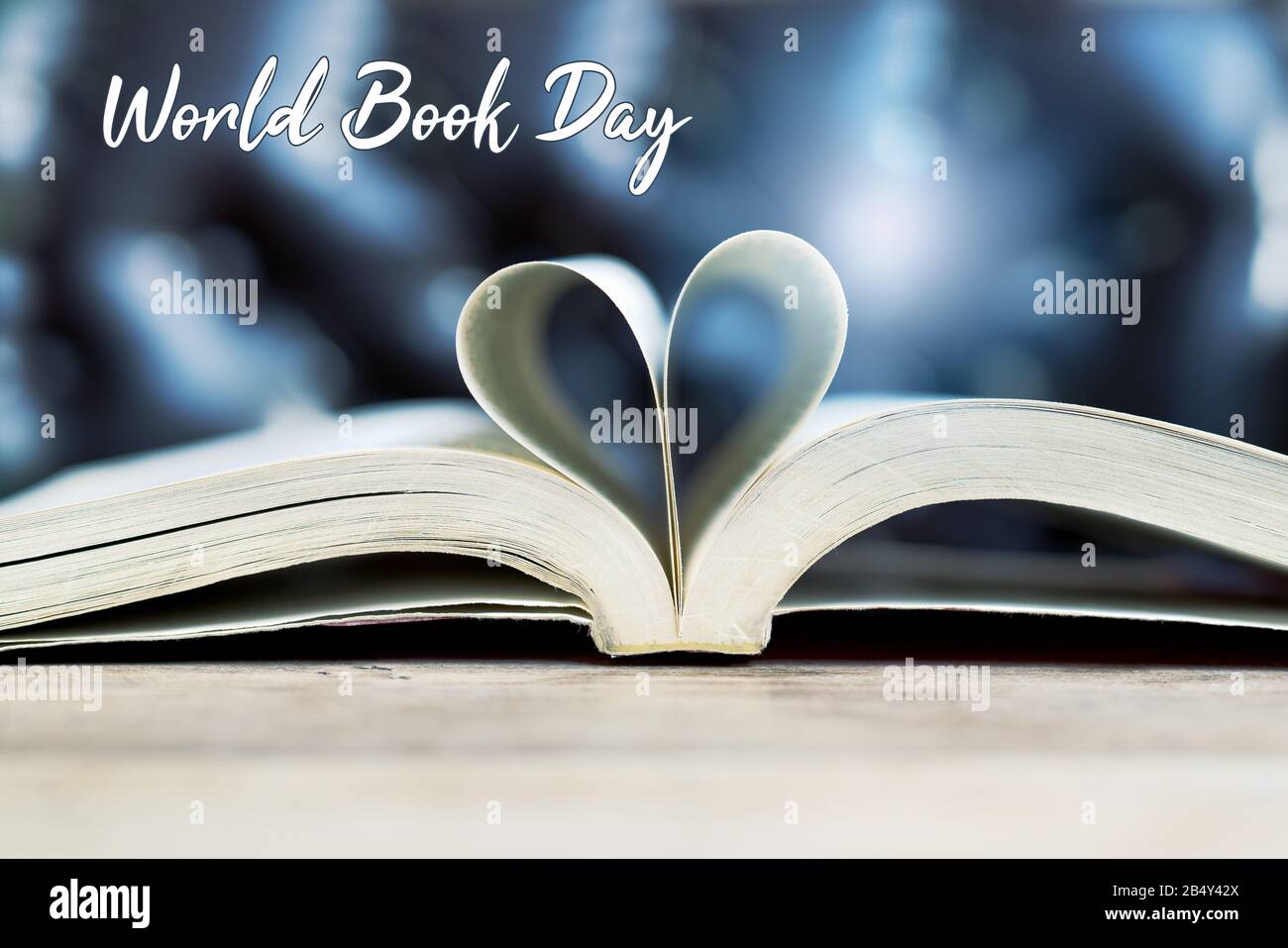 Open book heart pages flower hi-res stock photography and images - Alamy
