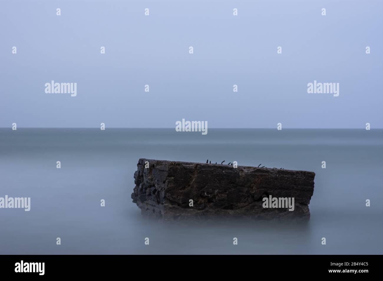 A cube in the sea Stock Photo - Alamy