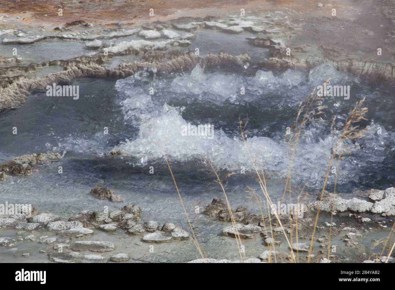 Hot springs in Yellowstone National Park with boiling water and steam ...